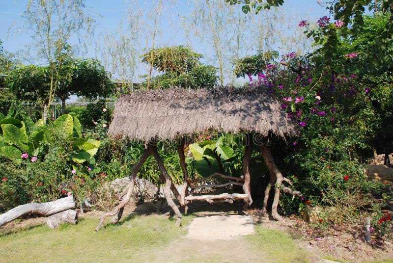 Thatched Pavilion in Garden Stock Photo - Image of thatched, sunny: 7499506