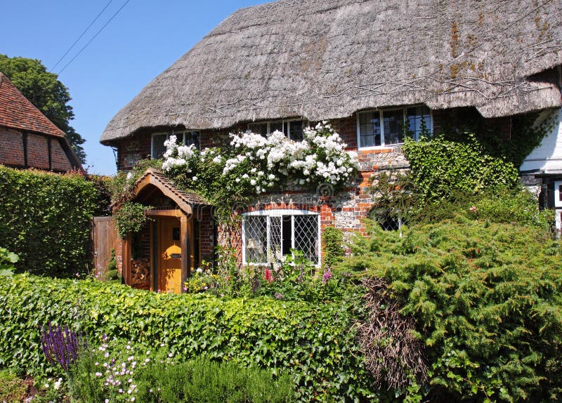 Thatched Village Cottage stock photo. Image of cottage - 14885904