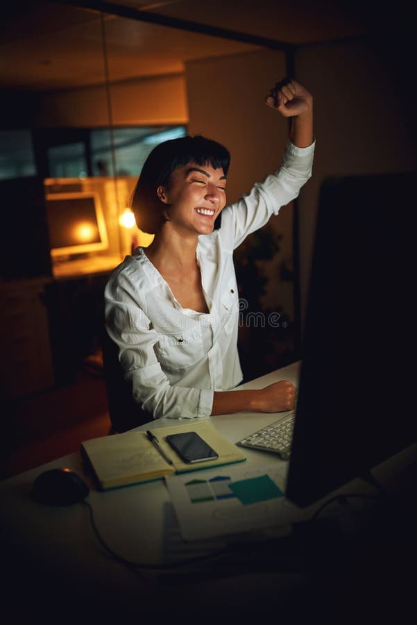 And Thats Why I Stayed Late. a Young Businesswoman Using a Computer and ...