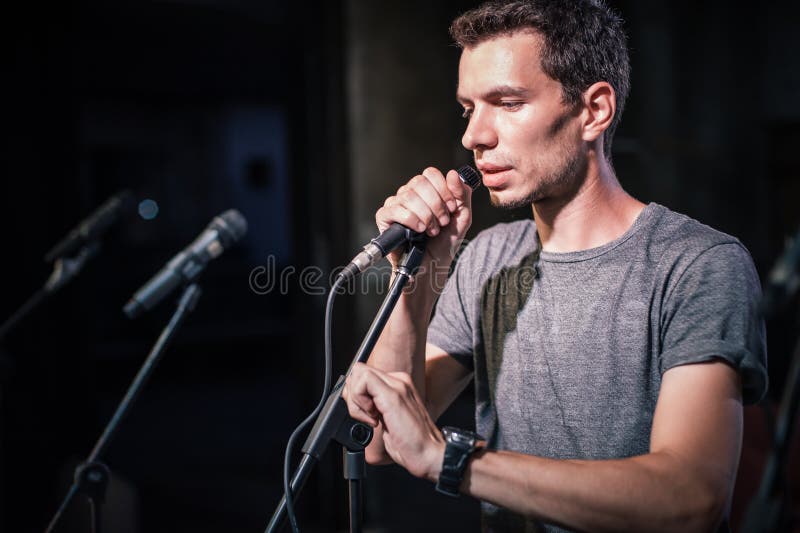 Theater Audio Technician Adjusting an Microphones on the Scene Stock ...