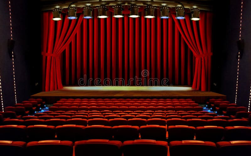 Theater Stage with Red Curtains and Seats Under Spotlights Stock Image ...