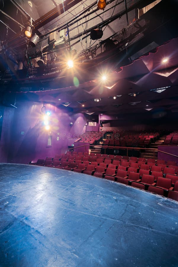 Theater Stage and Seats with Dramatic Lighting Stock Image - Image of ...