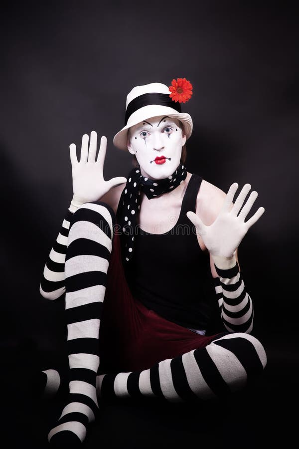 Theatrical Mime with Red Flower Sits on the Floor Stock Image - Image ...