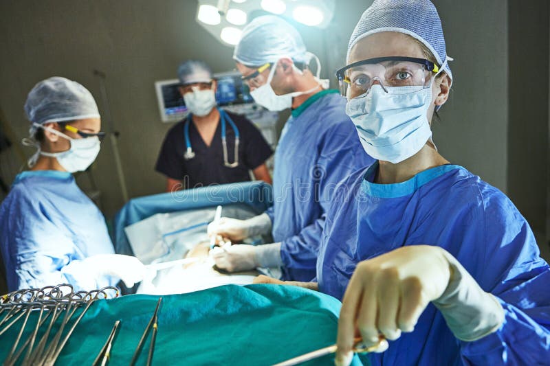 Their Patient is in Excellent Hands. Surgeons in an Operating Room ...