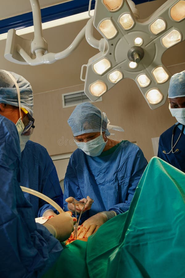 Their Speciality is Saving Lives. a Team of Surgeons Performing a ...