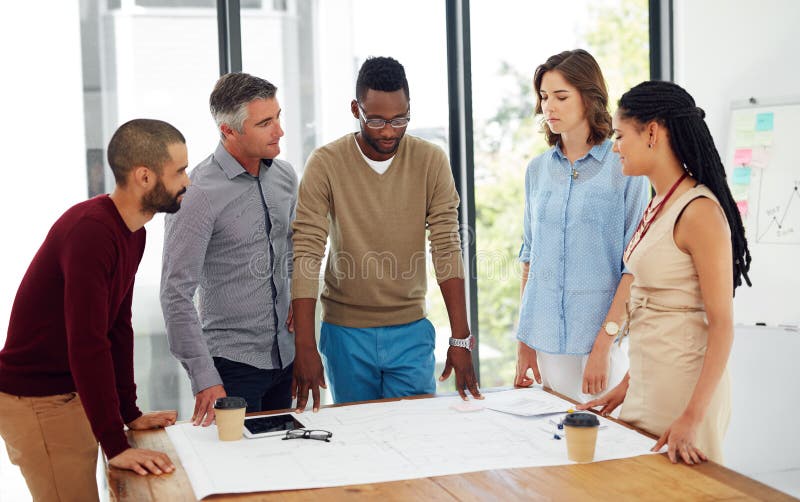 Their Success is Grounded on Teamwork. a Group of Architects in the ...