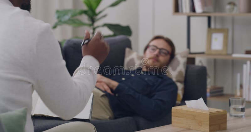 Therapist Gesturing with Hands while Talking To Patient Working through ...