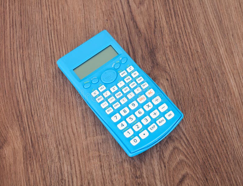 There is a Blue Calculator on the Desk Stock Image - Image of keys ...