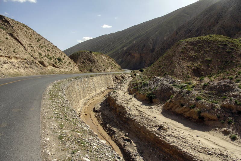There is a Winding Mountain Road Under the Rugged and Dangerous ... There is a Winding Mountain Road Under the Rugged and Dangerous ...