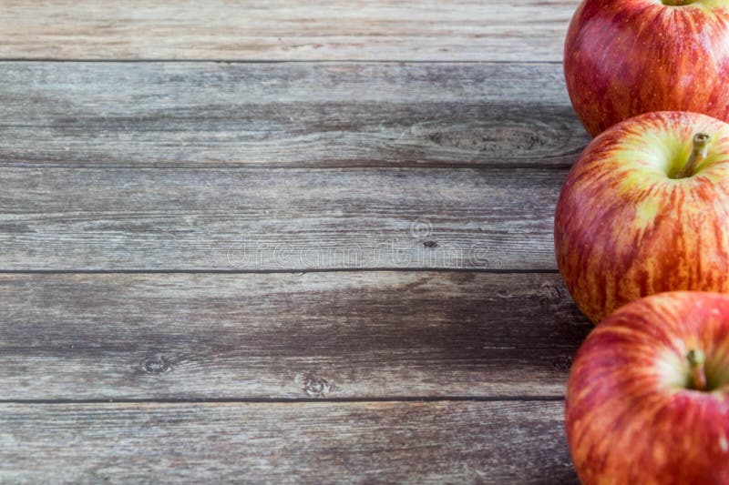 There are Many Apples that are Sitting on the Floor Together Stock ...