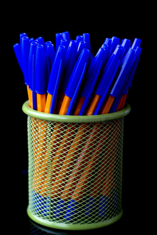 There are Many Pens for Writing in a Holder on the Table Stock Photo ...