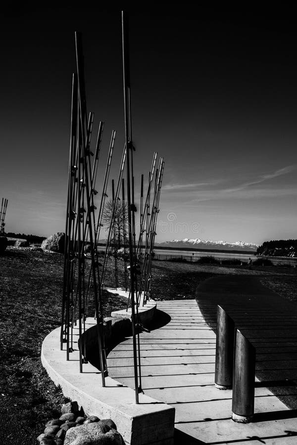 There are Many Poles that are Lined Up in Front of the Shore Stock ...