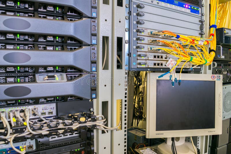 Many Racks with Servers Located in the Server Room. Bright Display a ...