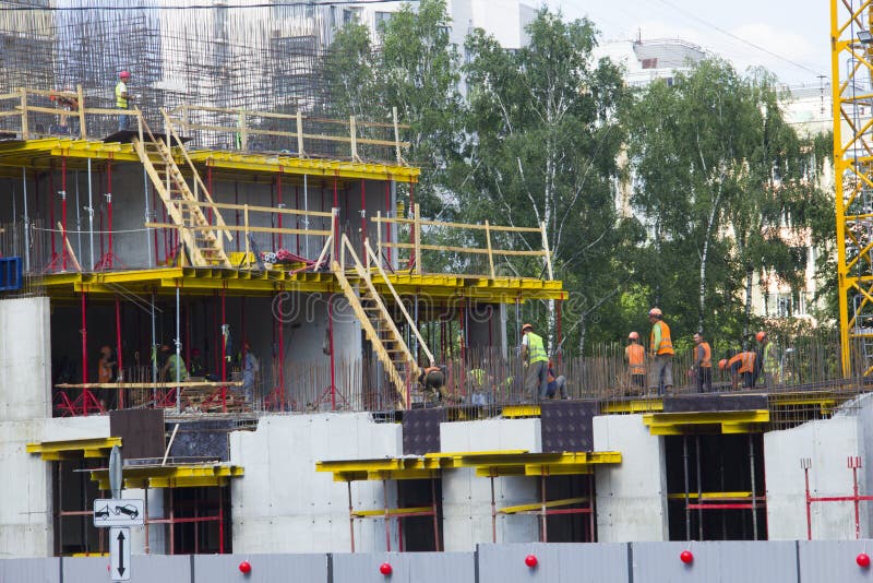 There are Many Workers Working at the Construction Site. Workers on the ...