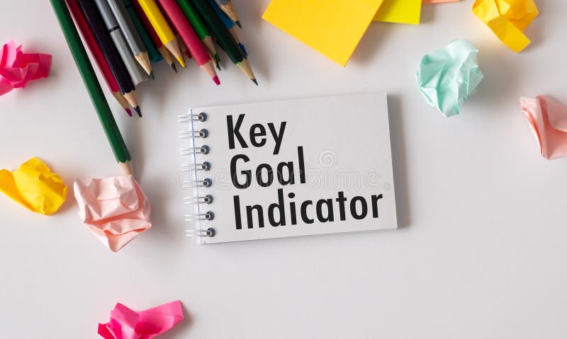 There is Notebook with the Word Key Goal Indicator. it is an Eye ...