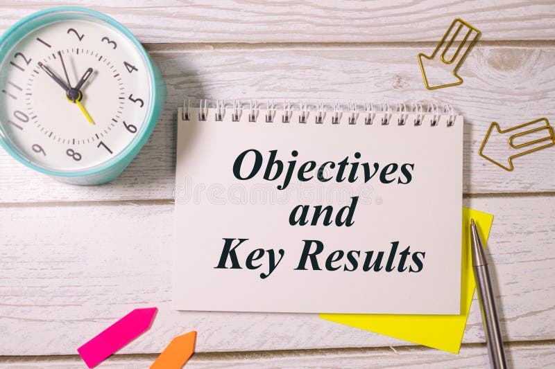 There is Notebook with the Word Objectives Key Results. it is As an Eye ...