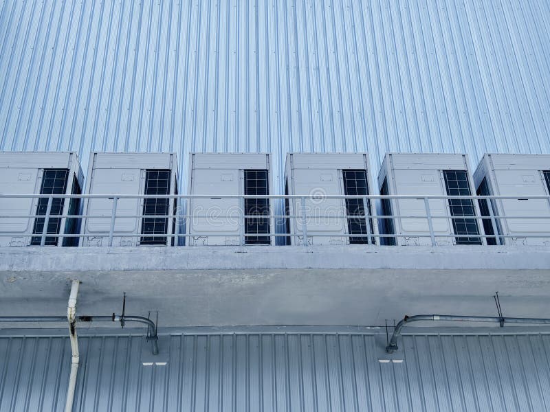 There are Numerous Air Conditioners Installed on the Exterior of the ...