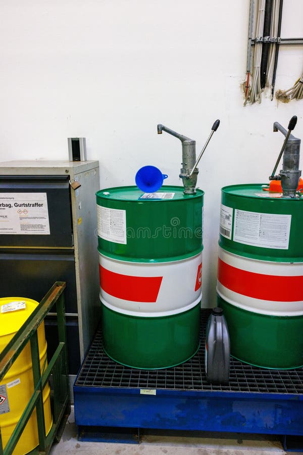 There are Oil Drums in a Garage for Tapping Oil Stock Image - Image of ...
