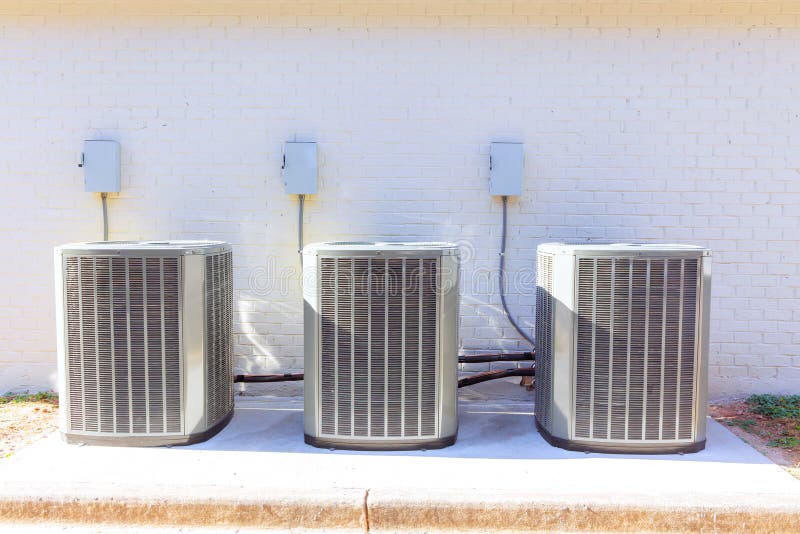 There is an Outdoor Air Conditioning System Units Installed on Exterior ...