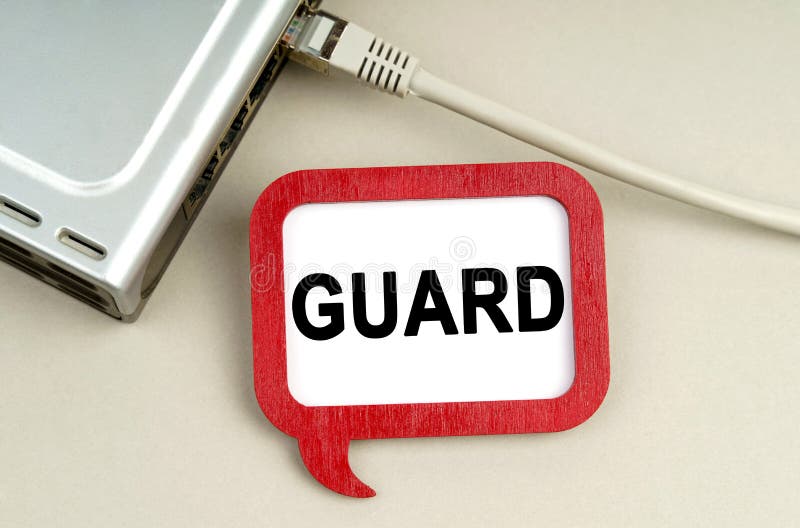 There is a Router Connected To the Network on the Table, Next To a Sign ...