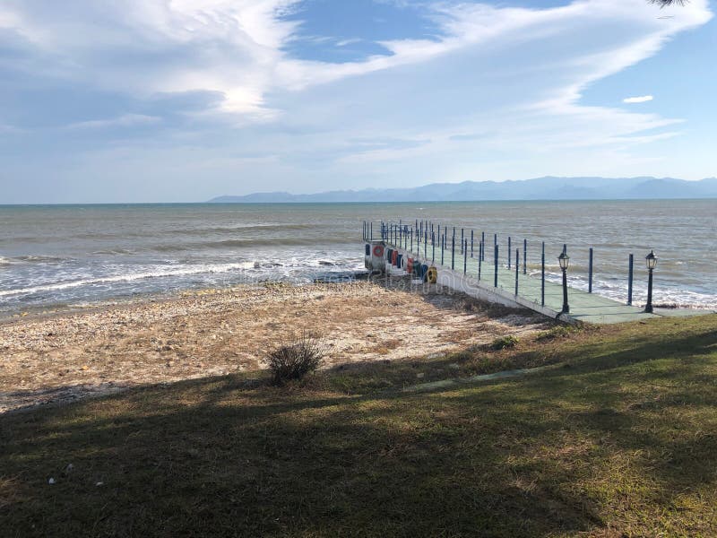 Pier Structure at Low Tide Reflections Stock Photo - Image of pier ...