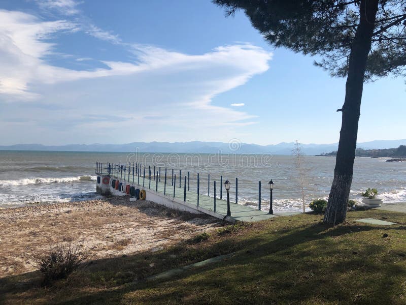 Pier Structure at Low Tide Reflections Stock Photo - Image of pier ...