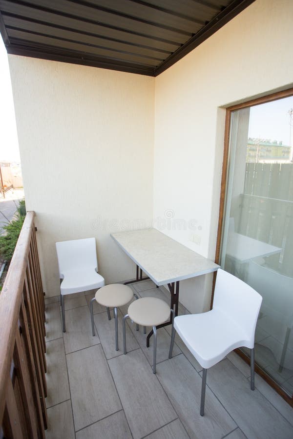 There is a Table and Chairs for Tea Drinking on the Summer Terrace ...