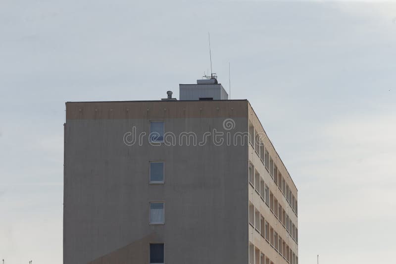 There is a Tall Building that Features a Prominent Tower Atop it Stock ...