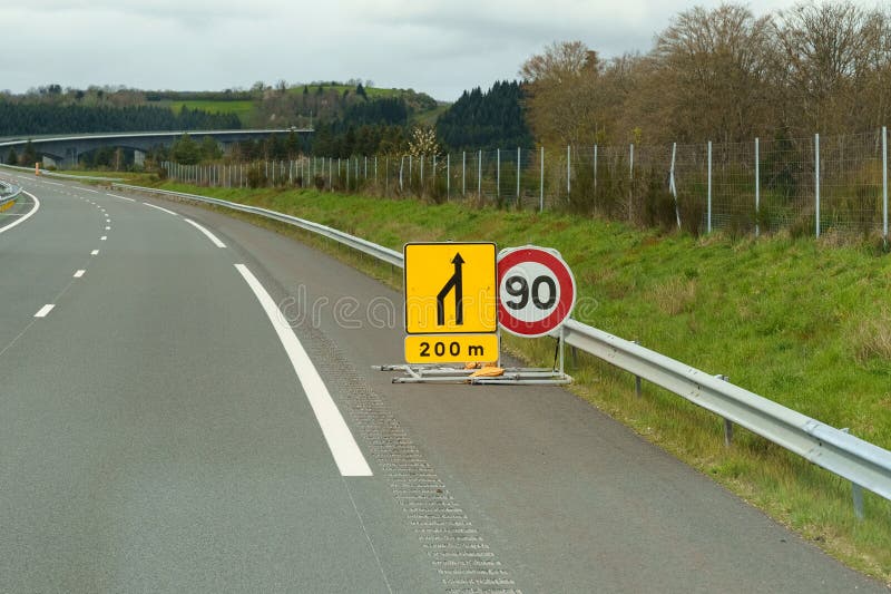 There is a Temporary Road Sign on the Motorway - the Narrowing of the ...