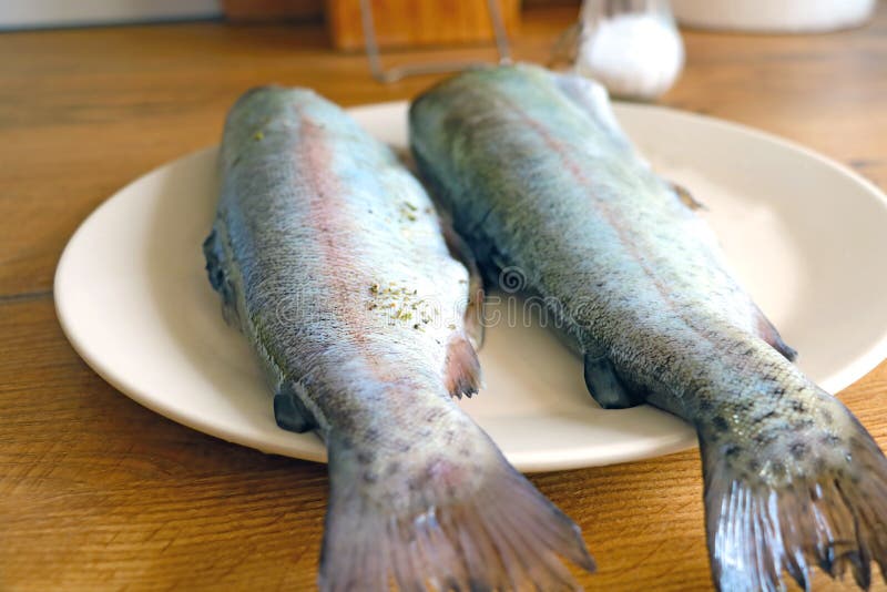 There are Two Fish for Cooking on the Plate Stock Image - Image of ...