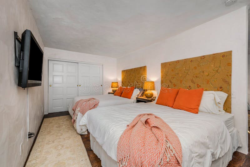 There are Two Twin Beds on the Same Side of this Room Stock Photo ...