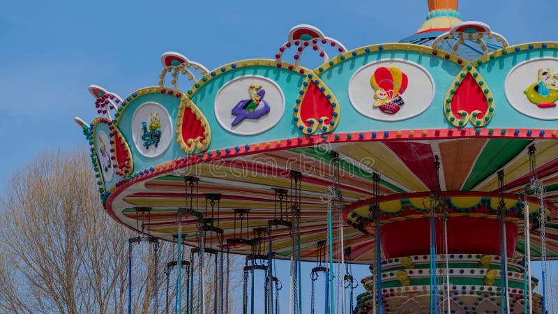 There are Various Colorful Patterns on the Roof of the Carousel in the ...