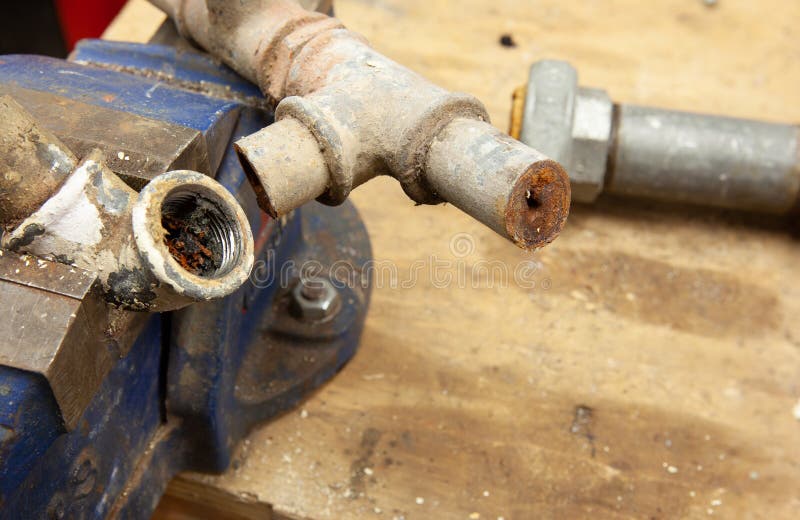 Rust in the water tube stock image. Image of polarization - 234130835