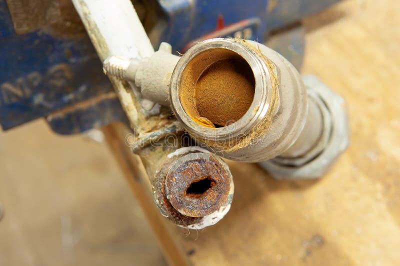 Rust in the water tube stock image. Image of bare, grunge - 234130837