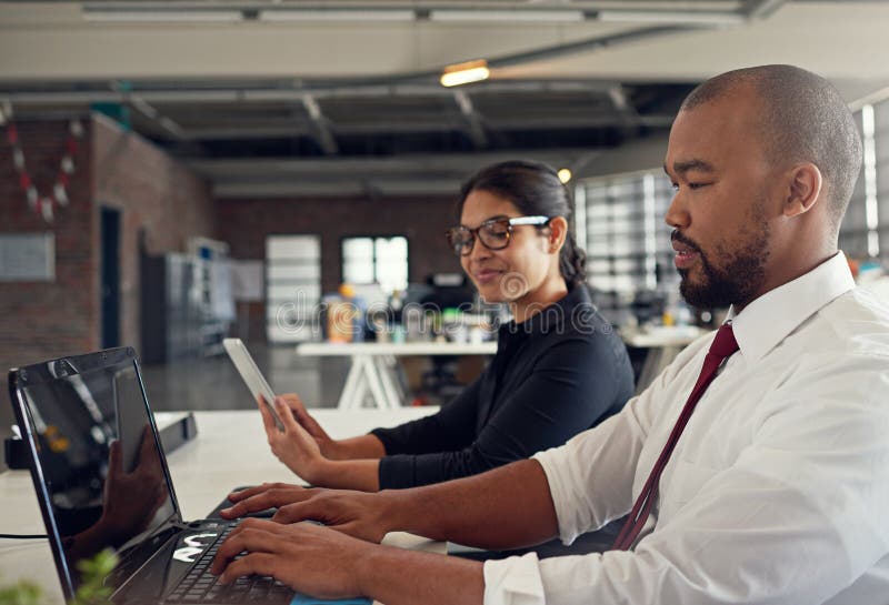 Theres No Substitute for Hard Work. Two Colleagues Working Together in ...