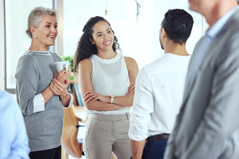 Theres always Time for a Chat. a Group of Businesspeople Talking in an ...