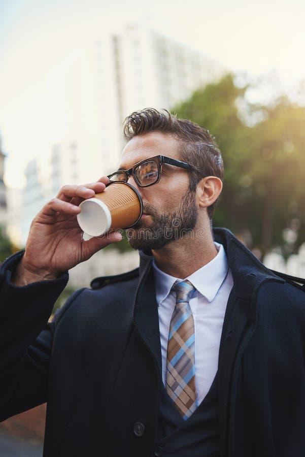 Theres always Time for a Quick Cup of Coffee. a Stylish Man Drinking a ...