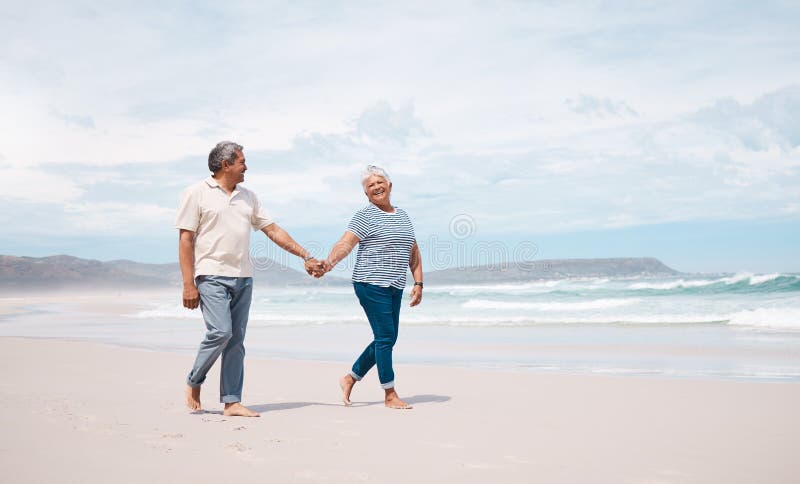 Theres always Time for a Stroll on the Beach. a Senior Couple Taking a ...
