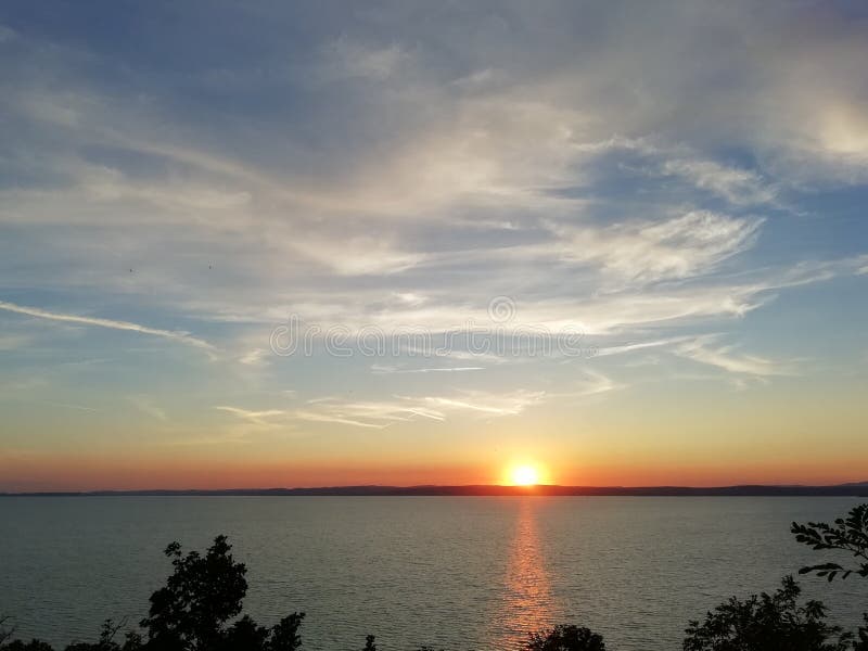 Sunset at the lake Balaton stock photo. Image of balaton - 126239420