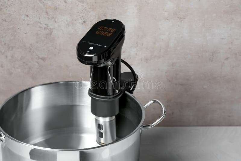 Thermal Immersion Circulator in Pot on White Table, Space for Text ...