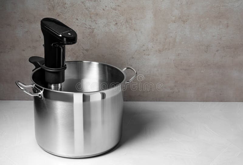 Thermal Immersion Circulator in Pot on White Table, Space for Text ...