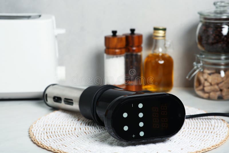 Thermal Immersion Circulator on Table in Kitchen, Closeup. Sous Vide ...