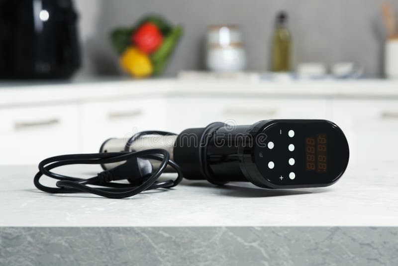 Thermal Immersion Circulator on Table in Kitchen. Sous Vide Cooking ...