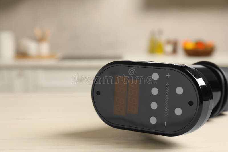Thermal Immersion Circulator on White Table in Kitchen, Closeup with ...