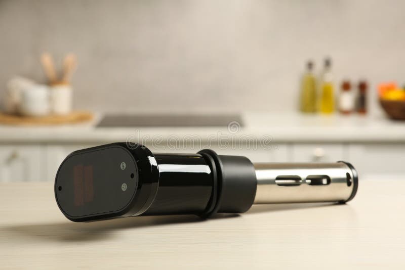 Thermal Immersion Circulator on White Table in Kitchen. Sous Vide ...