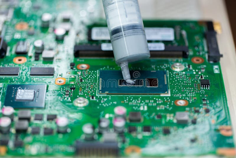 Thermal Paste is Applied To the Laptop Processor. Stock Image - Image ...