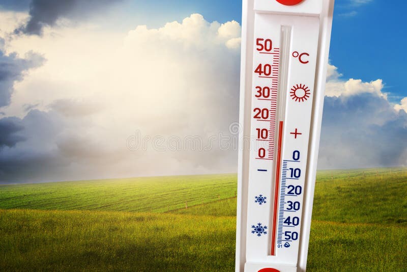 The Thermometer on the Background of the Spring Field Shows the ...
