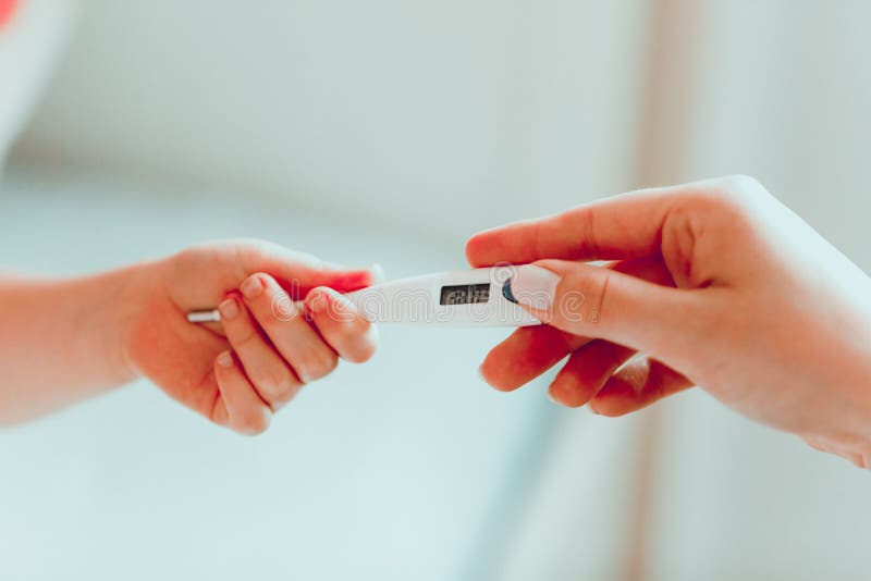 Cold compress in fever stock photo. Image of temperature - 139472888