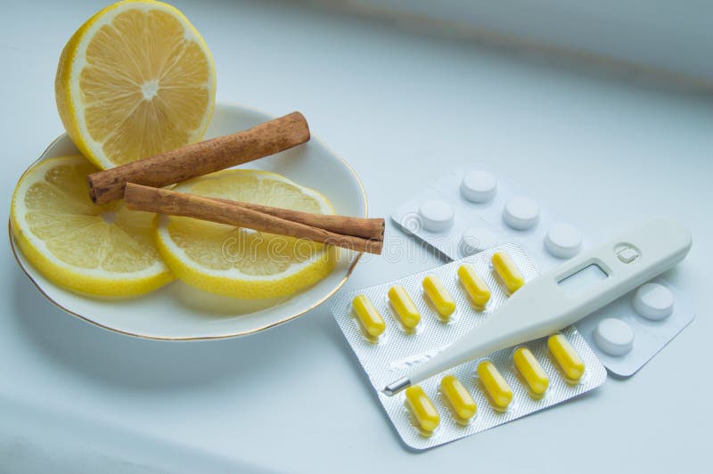 Thermometer, Lemon, Cinnamon, and Tablets - the Treatment of Colds ...