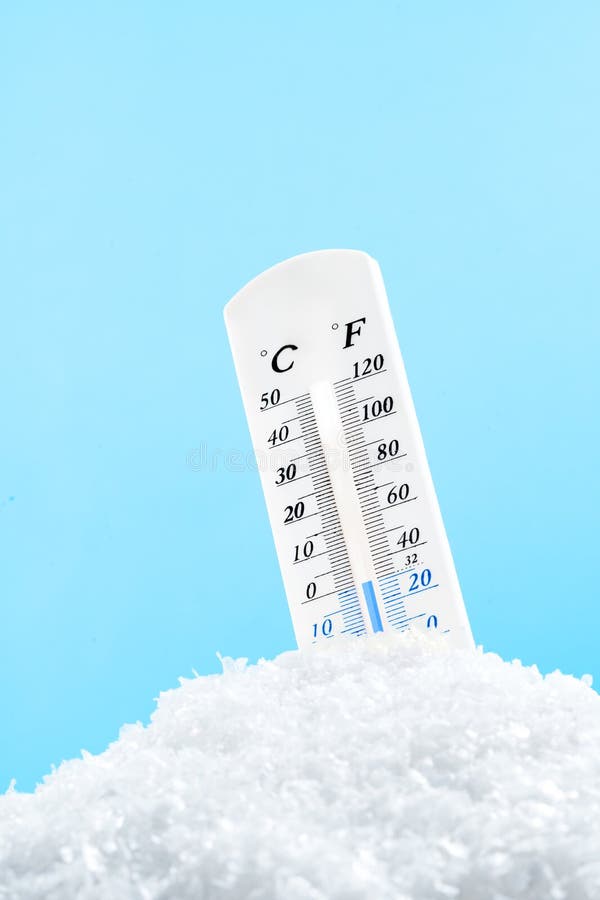 Thermometer Measuring Cold Temperature in Snow Against Blue Background ...